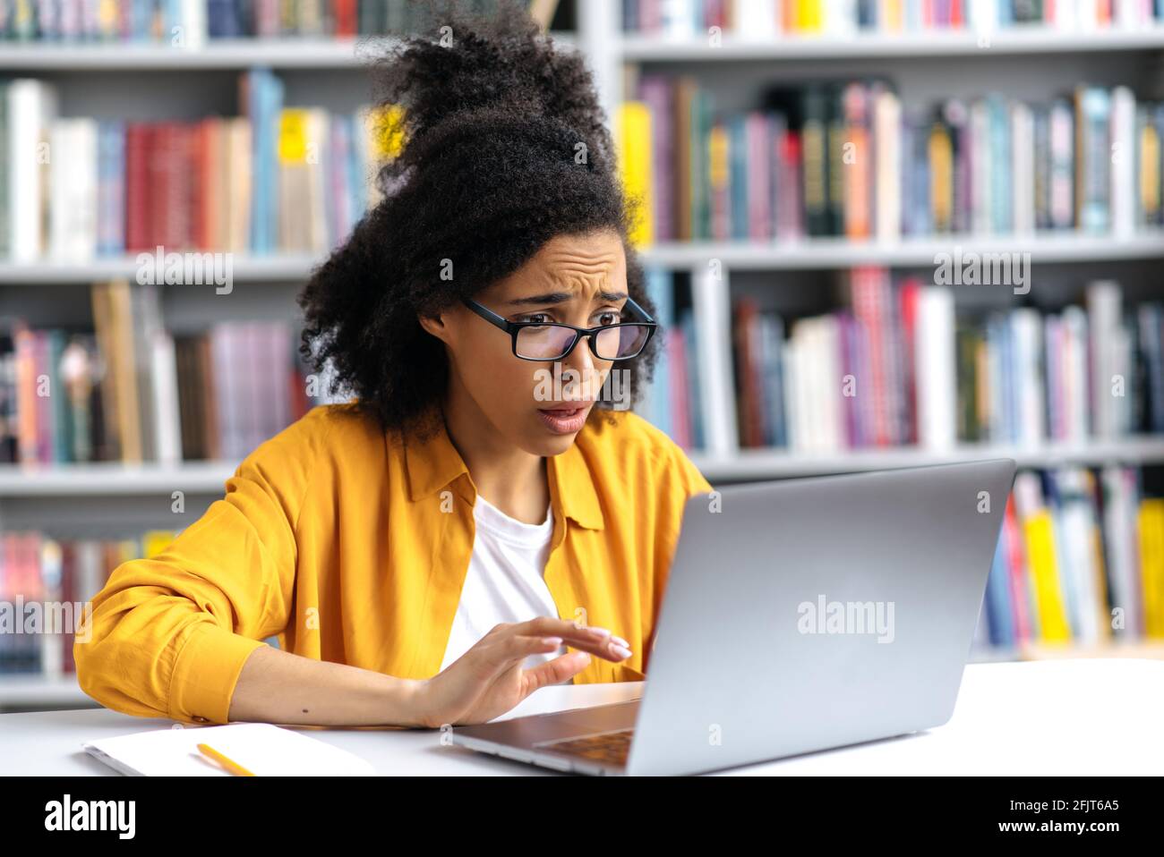Upset shocked overworked african american girl, student, in casual wear ...