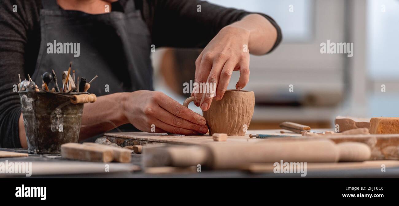 Female potter modeling clay hi-res stock photography and images - Alamy
