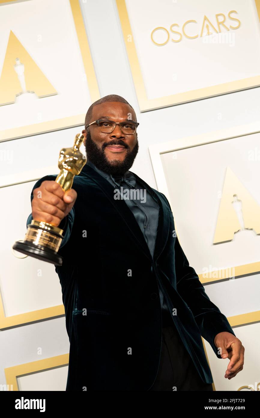 Tyler Perry poses backstage with the Gene Hersholt Humanitarian Award ...