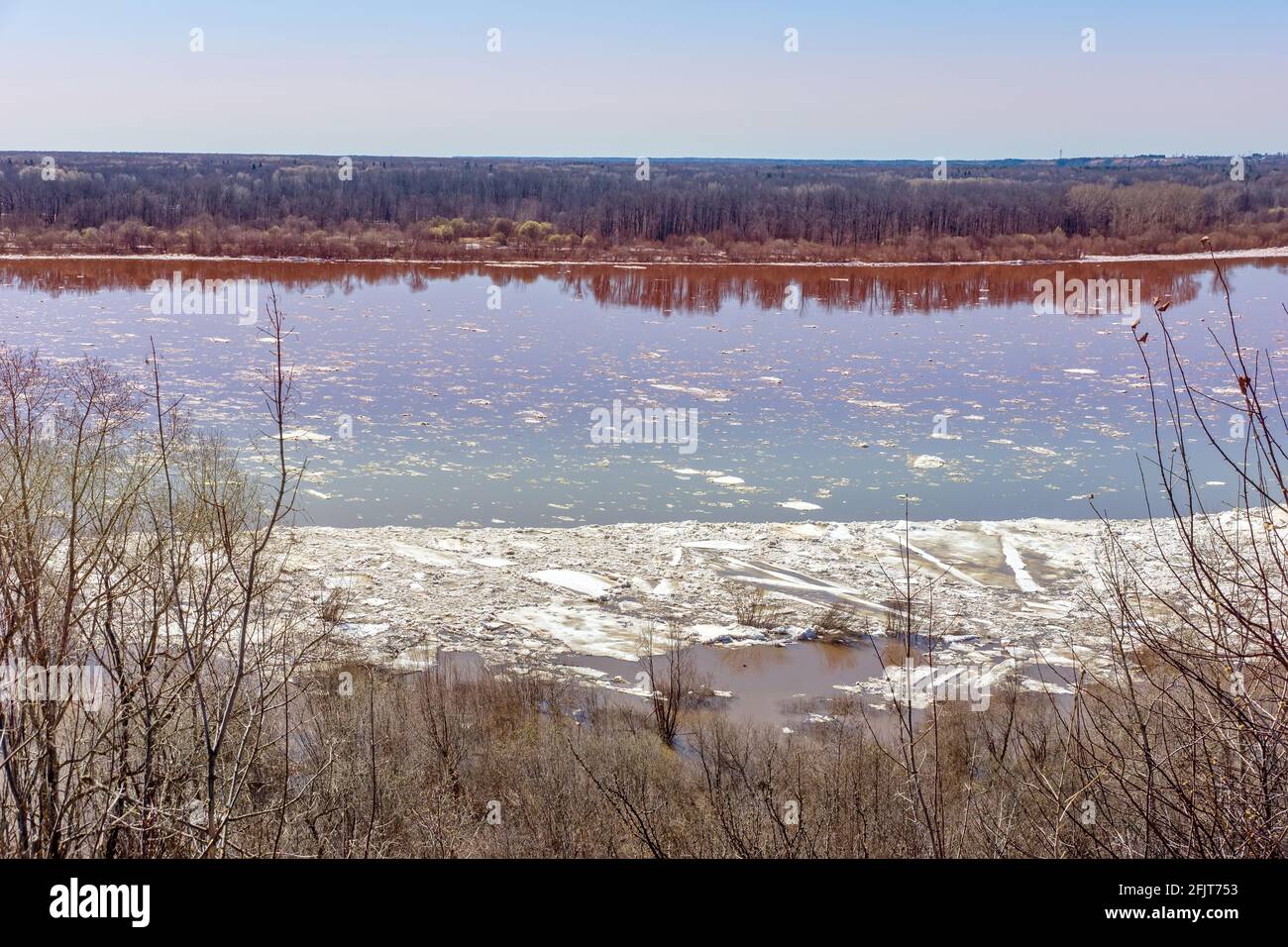 beautiful landscape with a river floating ice floes melting snow spring ...