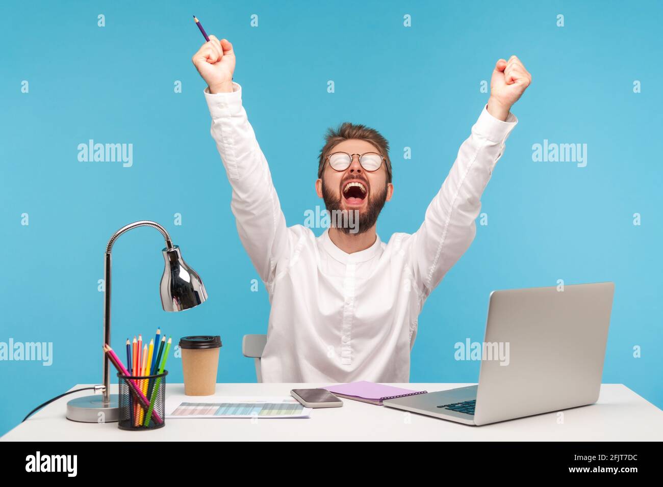 Very excited man with beard office worker screaming eureka raising ...