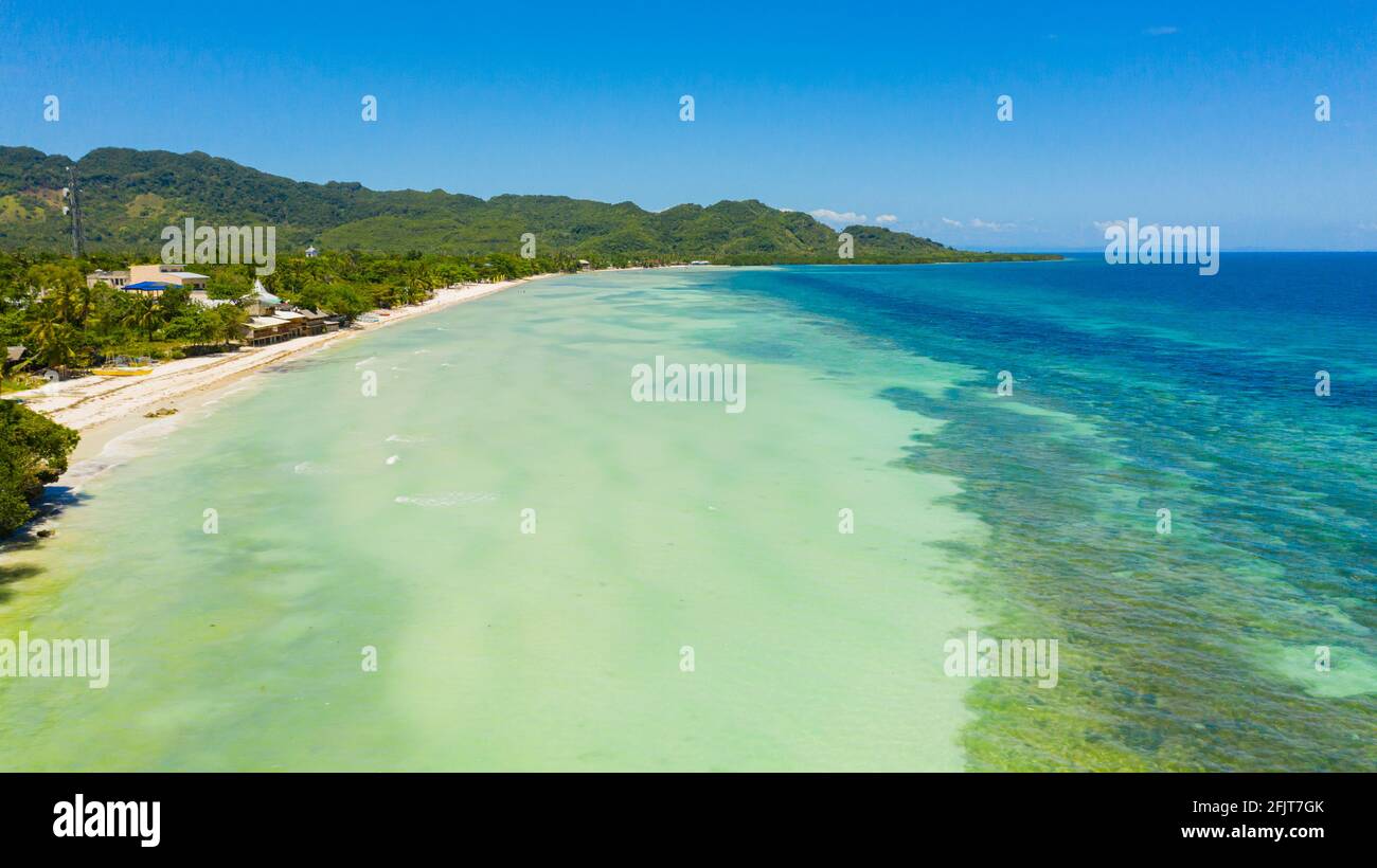 Tropical landscape: island with beautiful beach, palm trees by ...