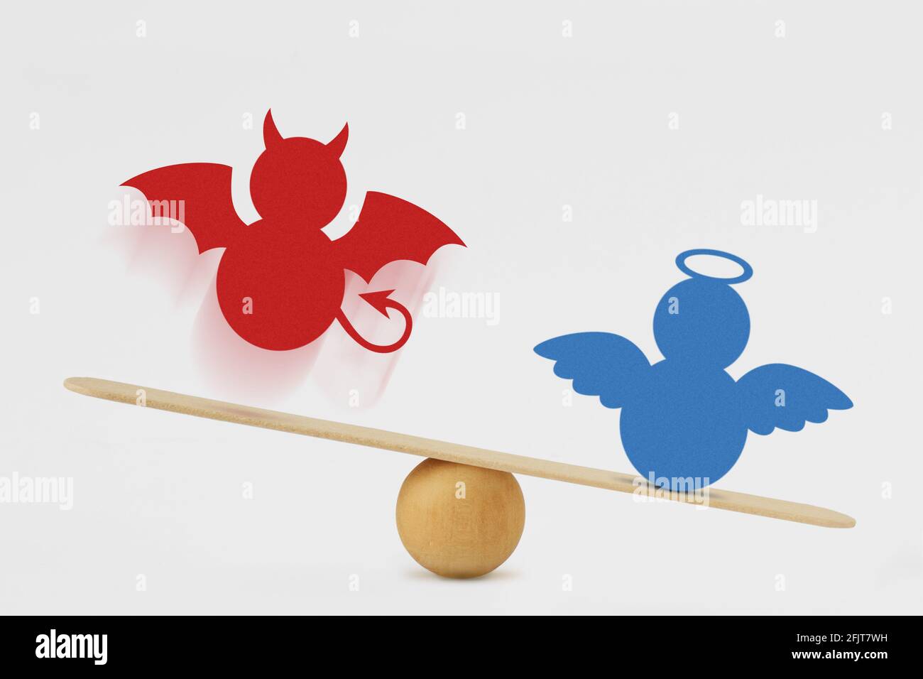 Devil and angel on balance scale - Victory of good over evil concept ...