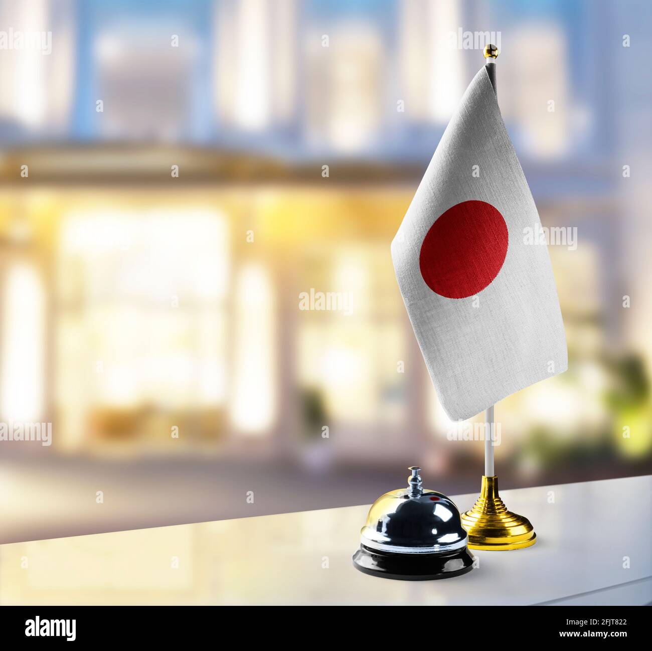 Japan flag on the reception desk in the lobby of the hotel Stock Photo ...