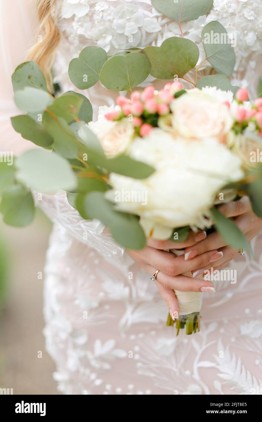 Closeup cute bride bouquet of roses Stock Photo - Alamy