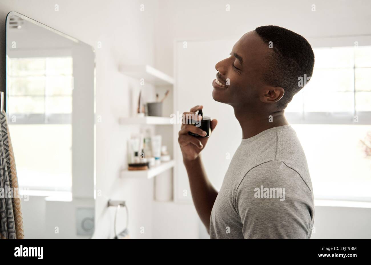Man spraying perfume hi-res stock photography and images - Alamy