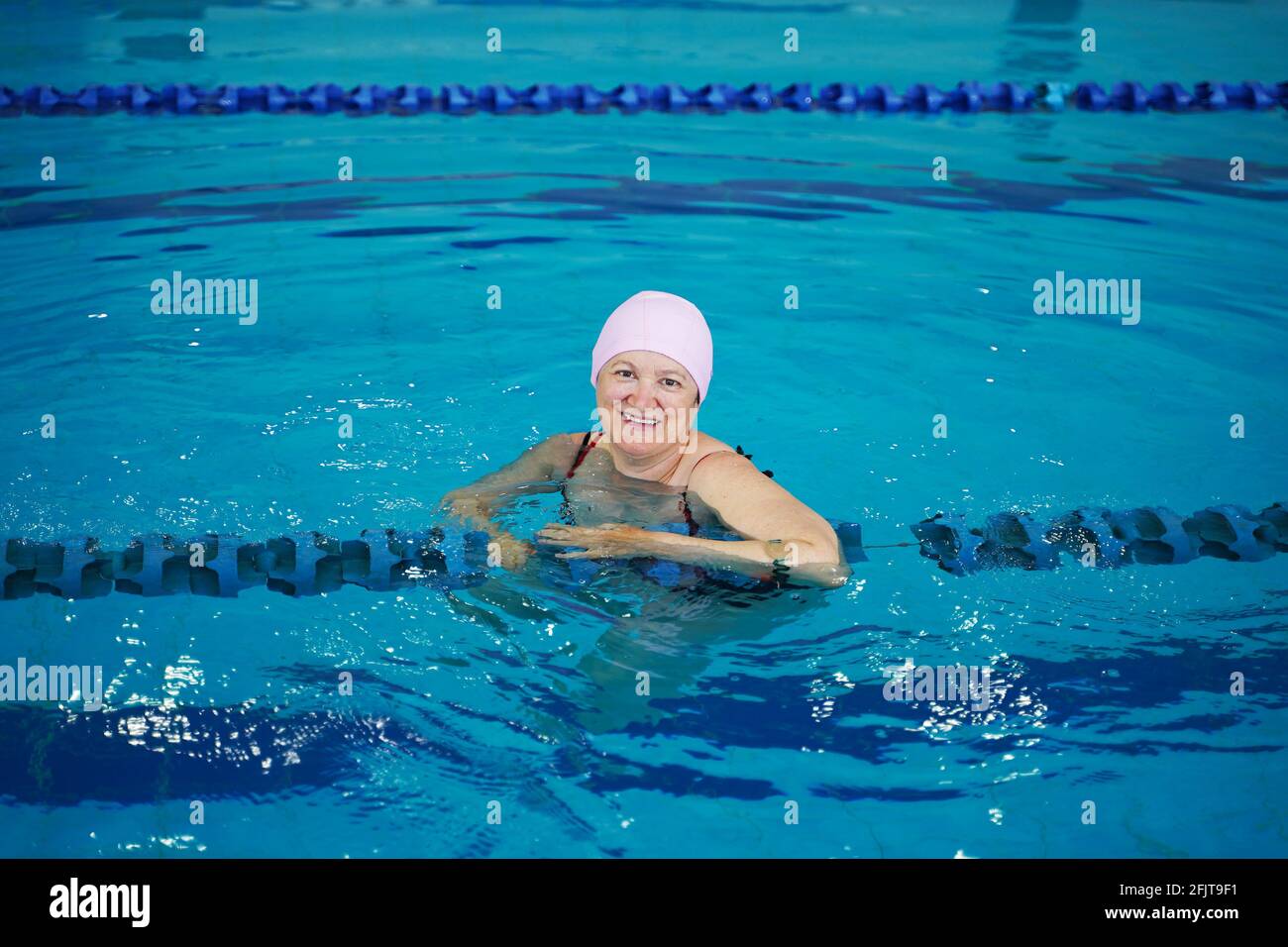 Middle aged swimming hi-res stock photography and images - Alamy