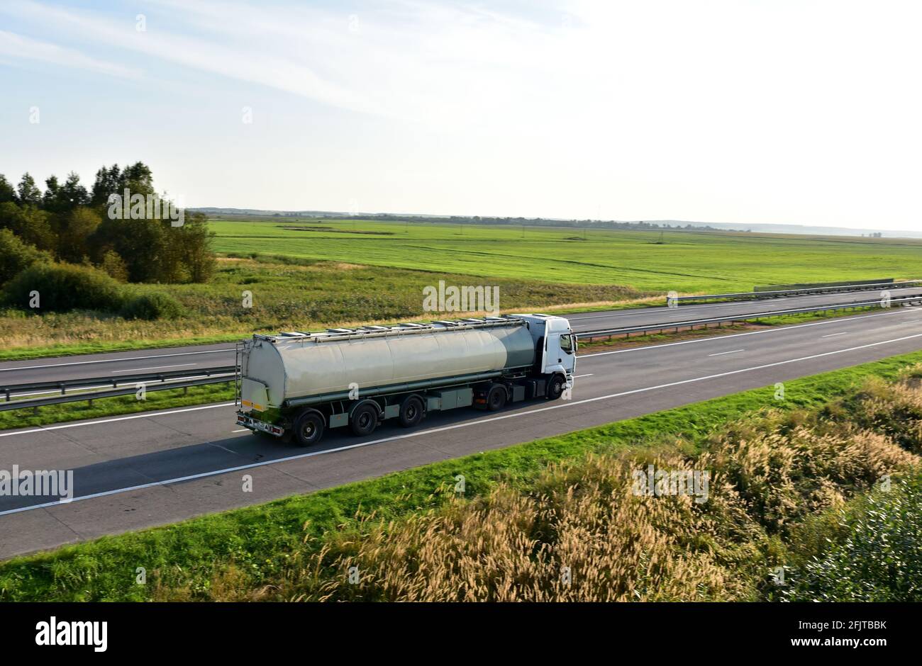 Tank transport of liquid, foodstuff. Metal chrome cistern tanker for ...