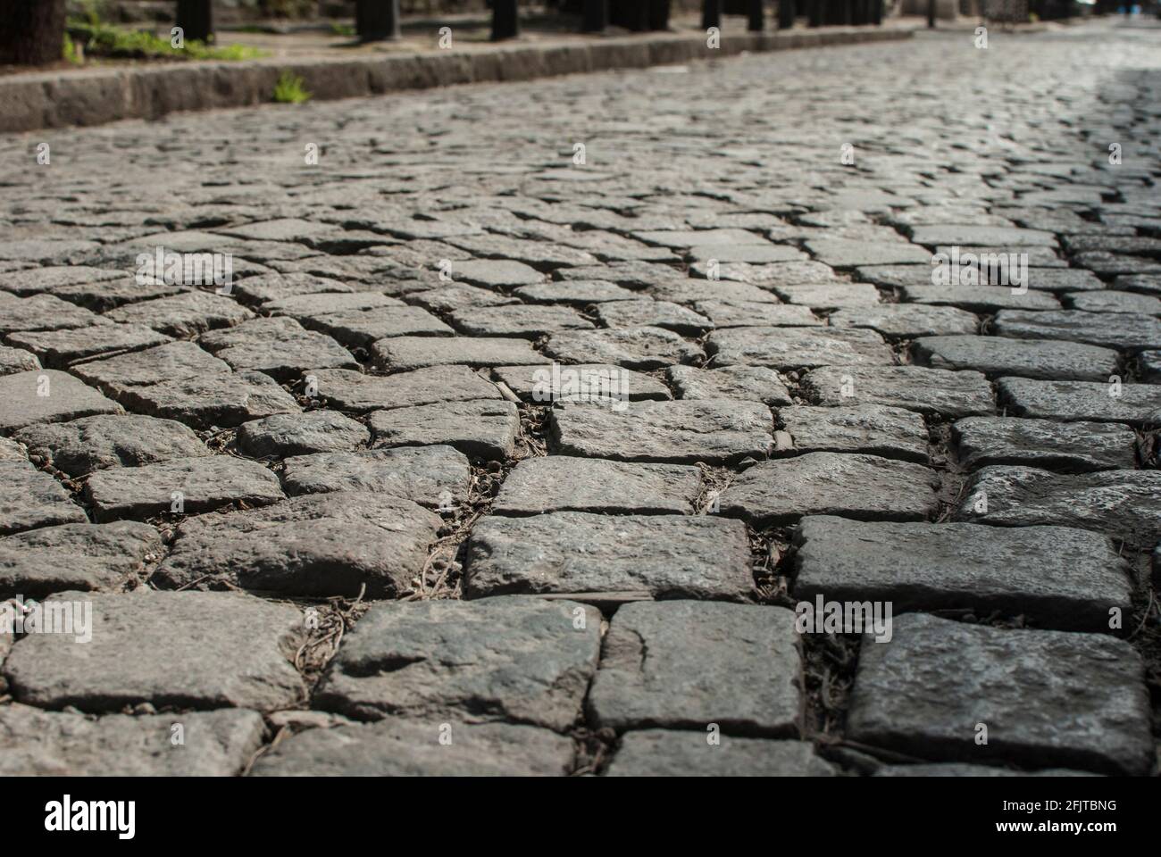 Stone paving roadway surface closeup as stone background Stock Photo ...