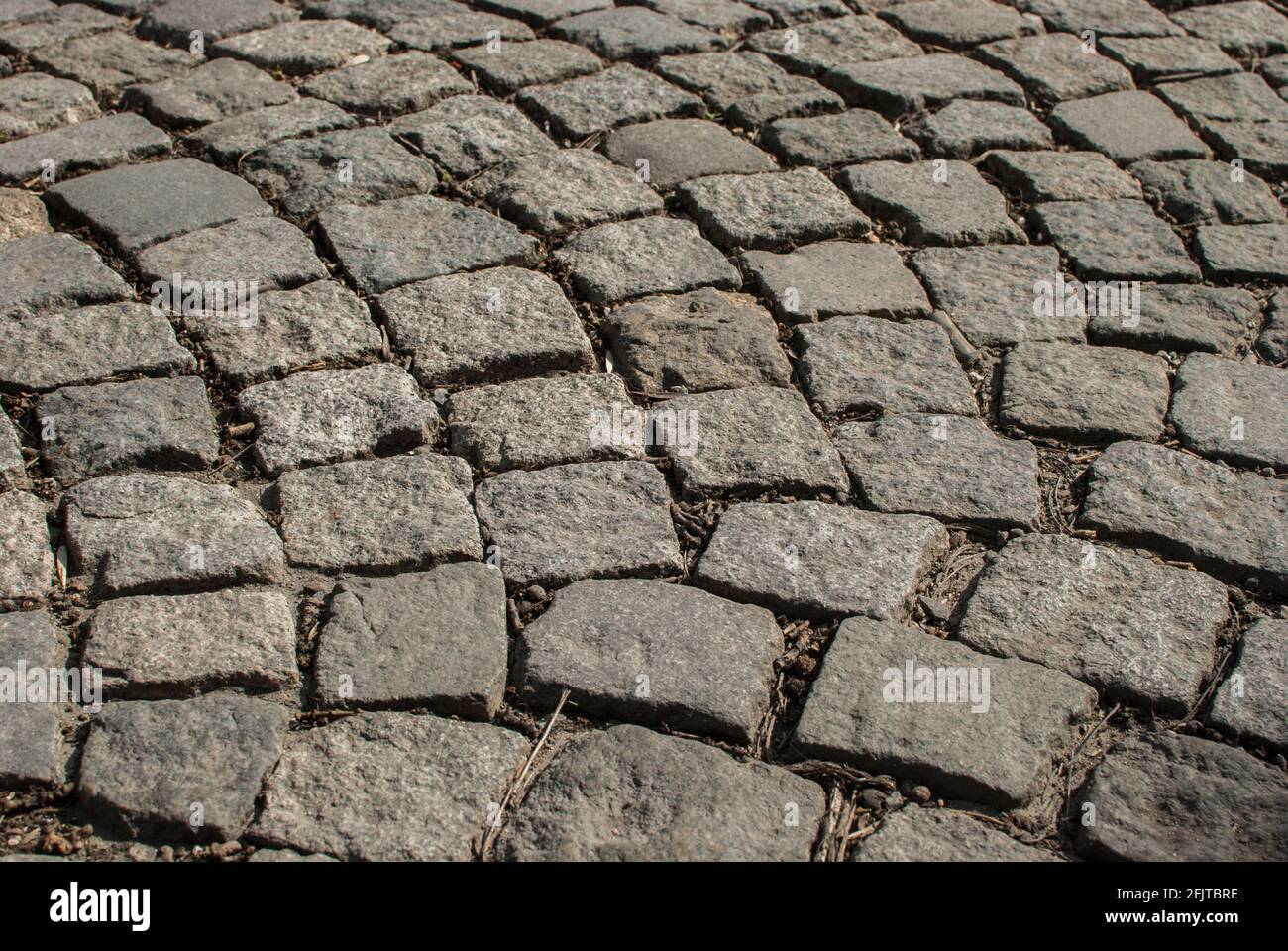 Stone paving roadway surface closeup as stone background Stock Photo ...
