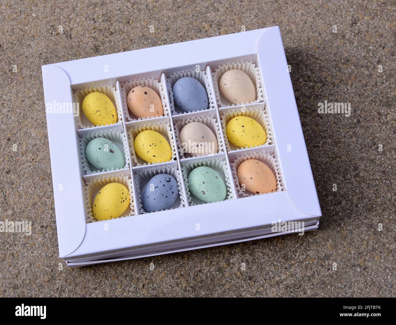 A packet of pastel coloured Easter eggs Stock Photo - Alamy