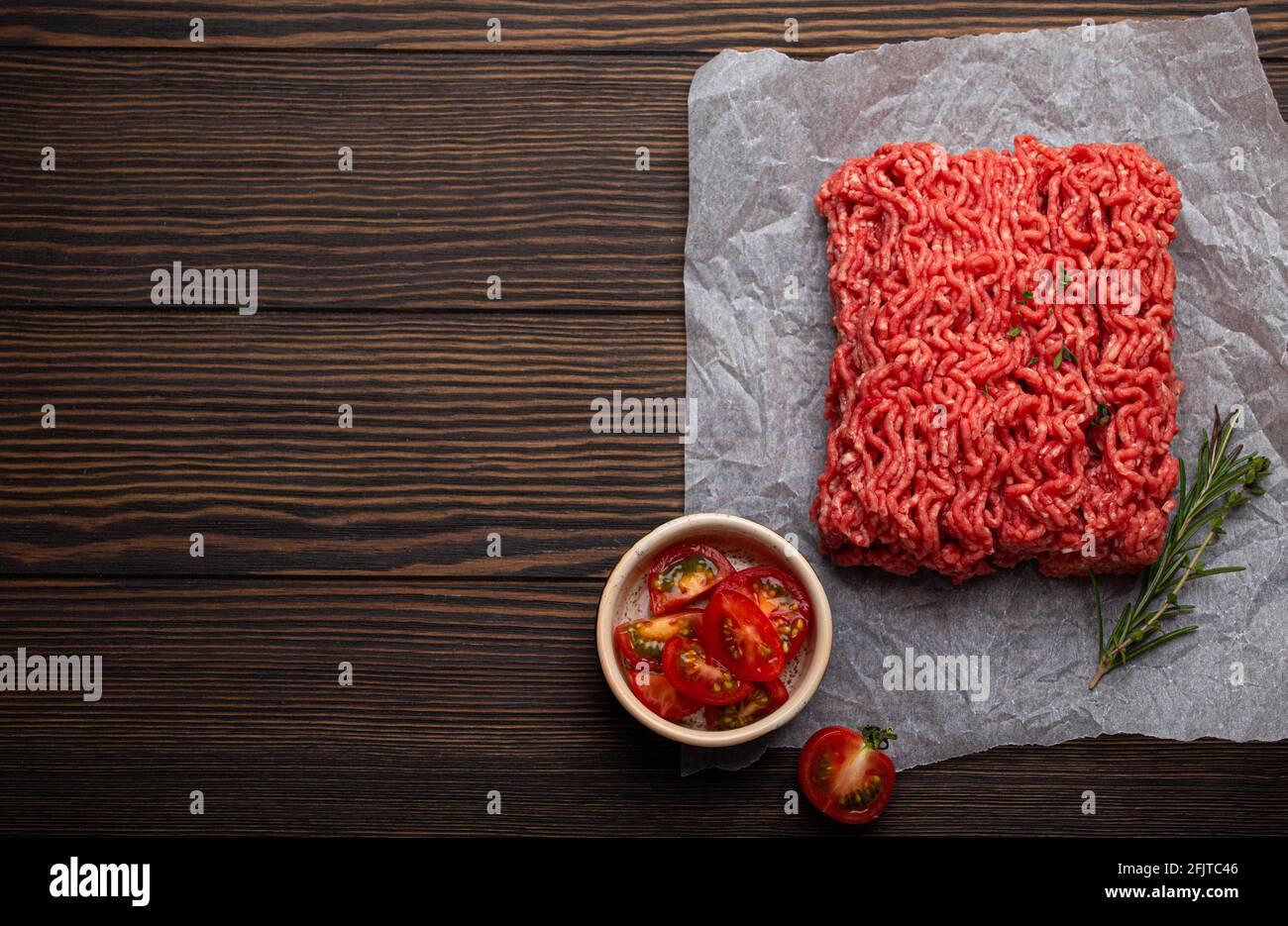 Raw minced meat with cooking ingredients from above copy space Stock ...