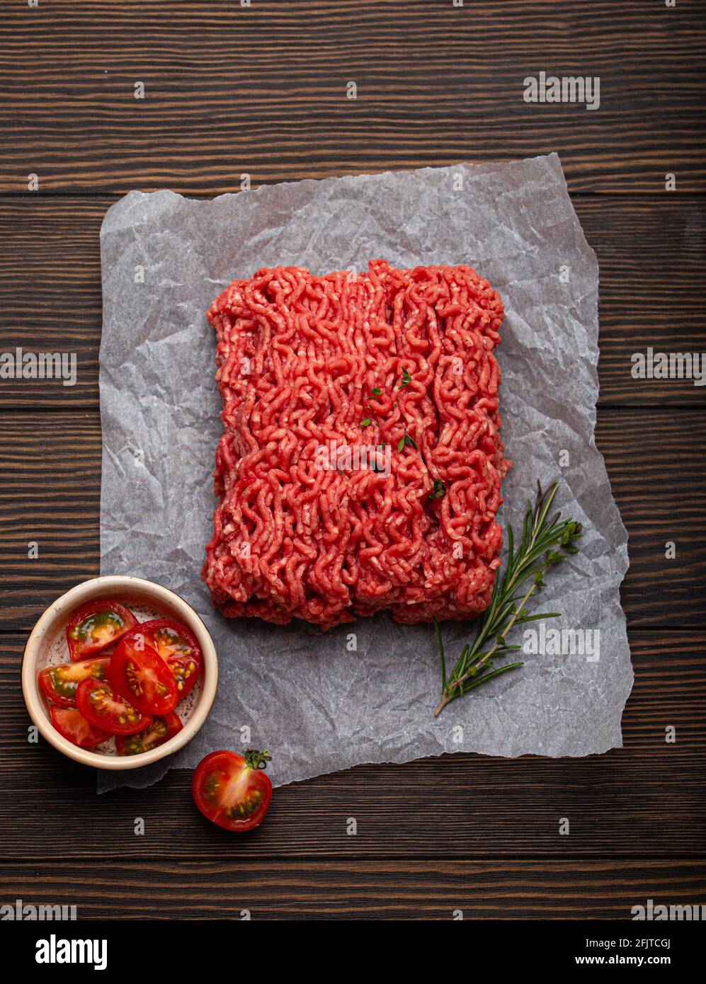 Raw minced meat with cooking ingredients from above Stock Photo - Alamy