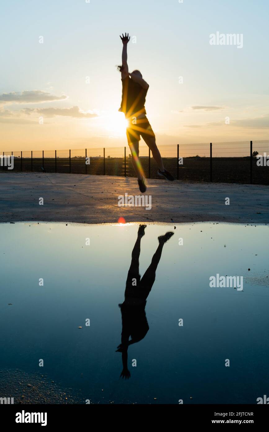 Concept: sport. Athlete man outdoors. Moving silhouette of person ...