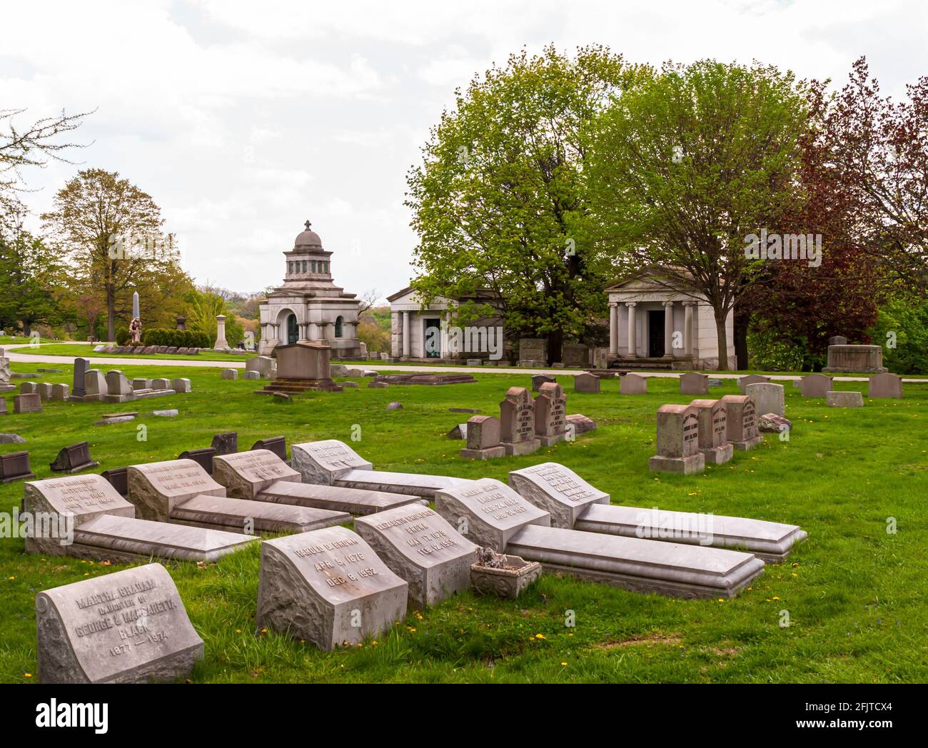 Graves and mausoleums in Homewood Cemetery on a spring day, Pittsburgh ...