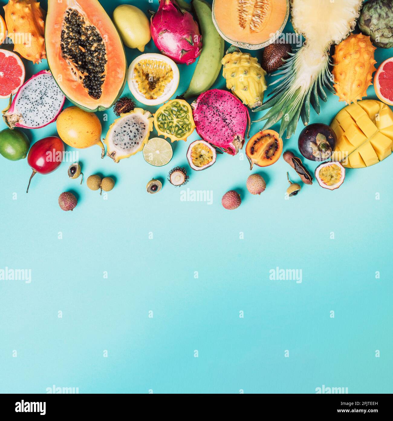 Tropical fruits concept. Exotic fruits - pineapple, papaya, mango ...