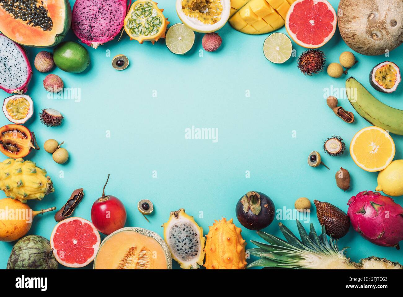 Tropical fruits concept. Exotic fruits - pineapple, papaya, mango ...