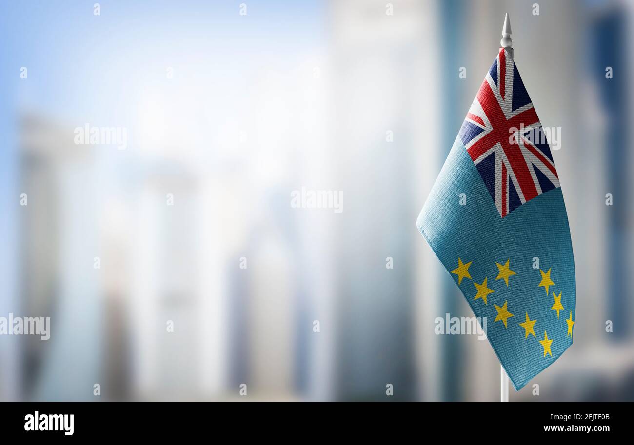 A small flag of Tuvalu on the background of a blurred background Stock ...