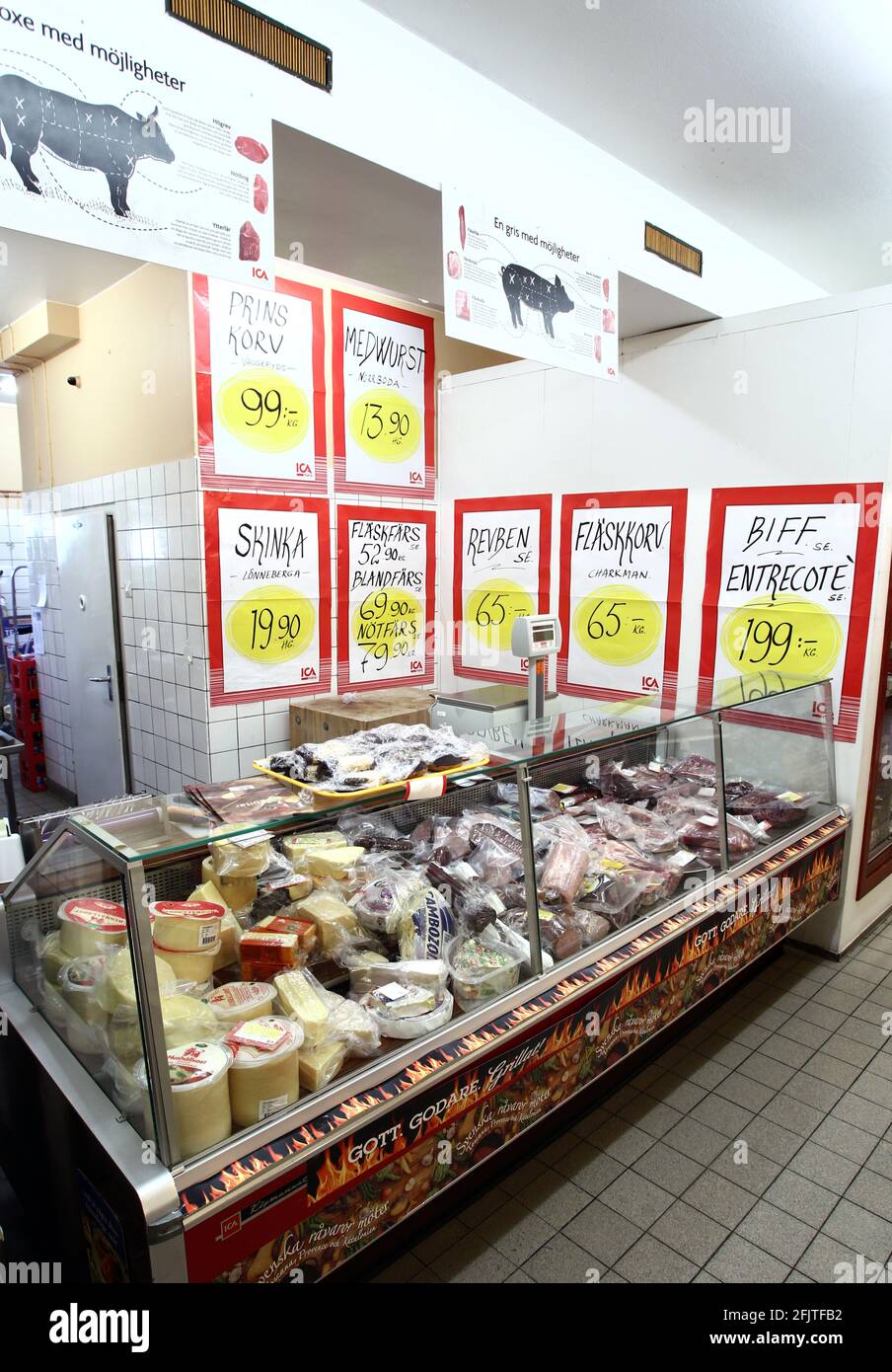 The charcuterie counter in a small ICA store Stock Photo - Alamy