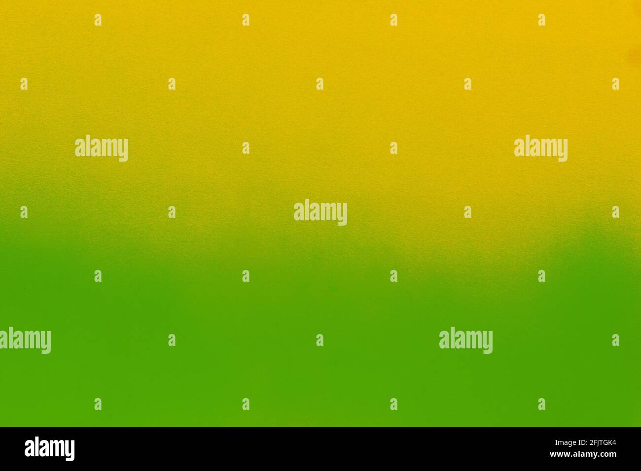 green spray paint on paper background Stock Photo - Alamy