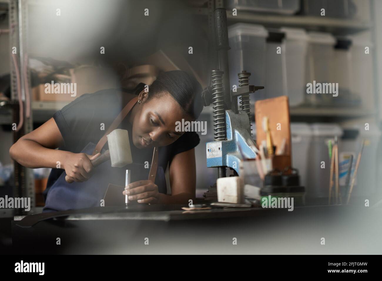 African woman working leather hi-res stock photography and images - Alamy