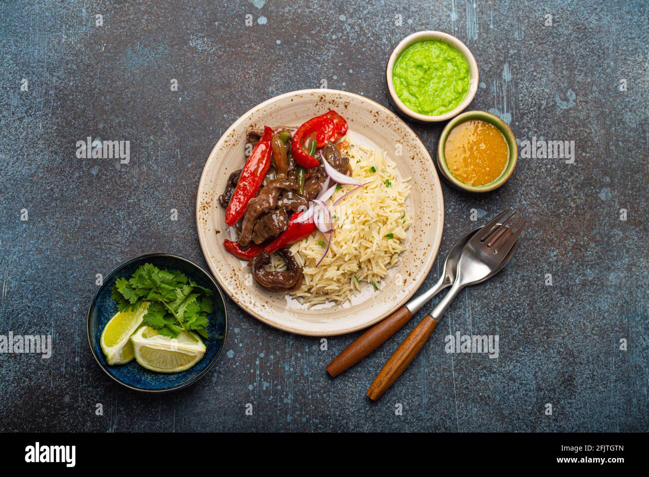 Traditional dish of Peru Lomo saltado with beef and pepper from above ...