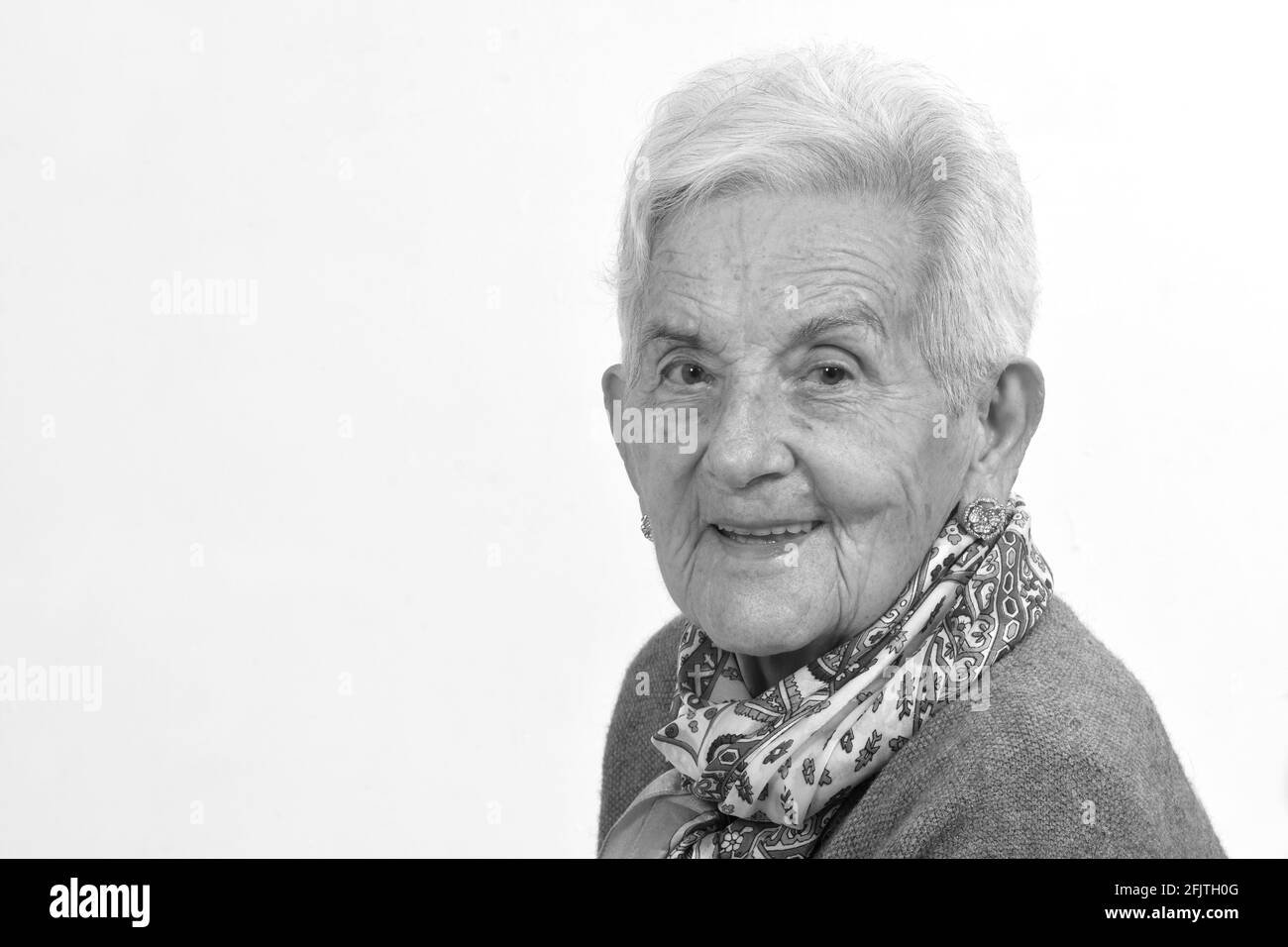 portrait of senior woman on white background, black and white Stock ...
