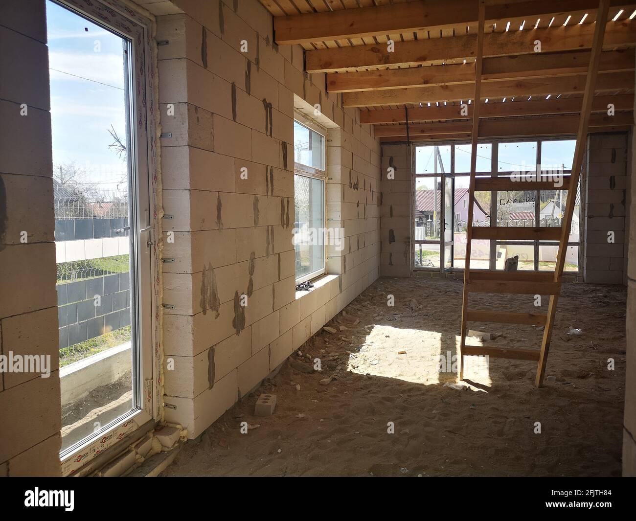 unfinished room with wooden ceiling Stock Photo - Alamy