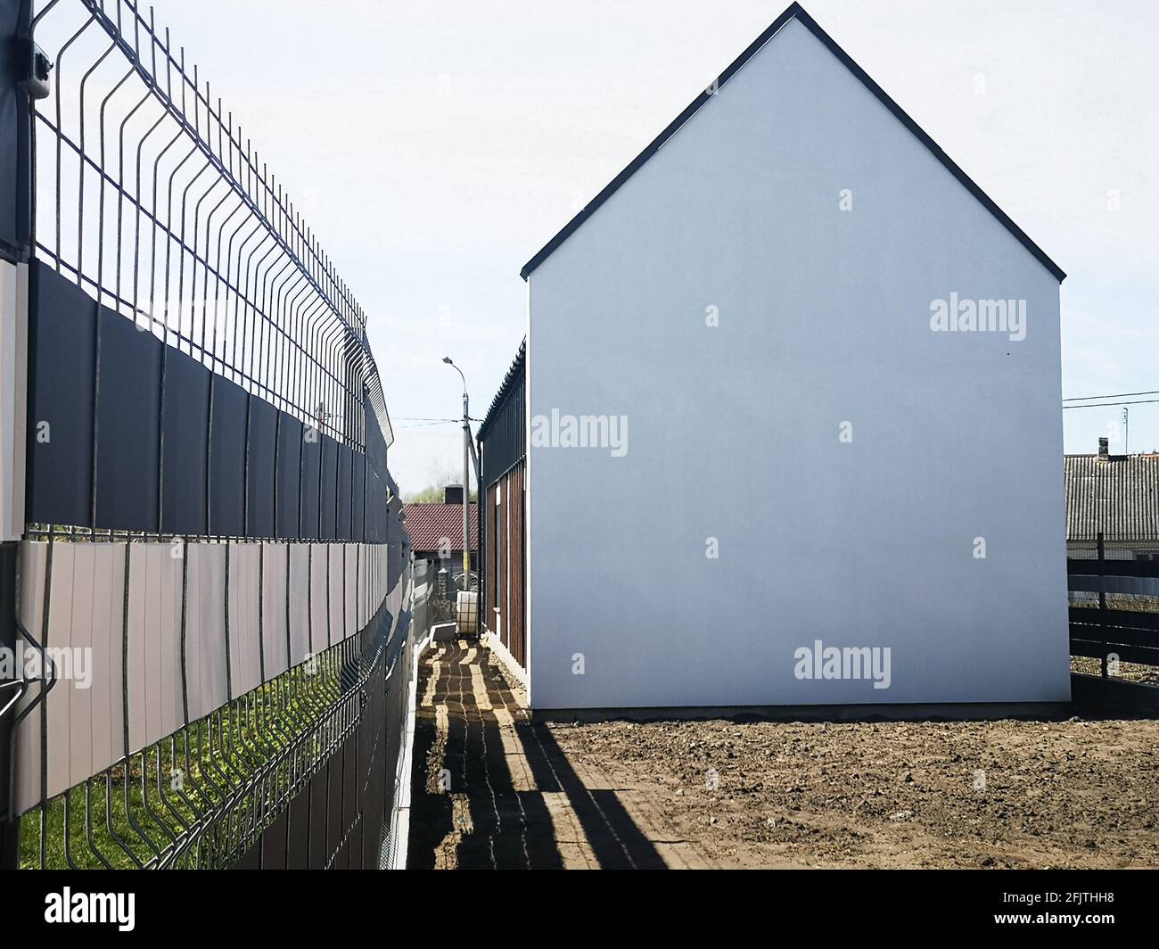 white house without windows. Empty house on the plot Stock Photo - Alamy