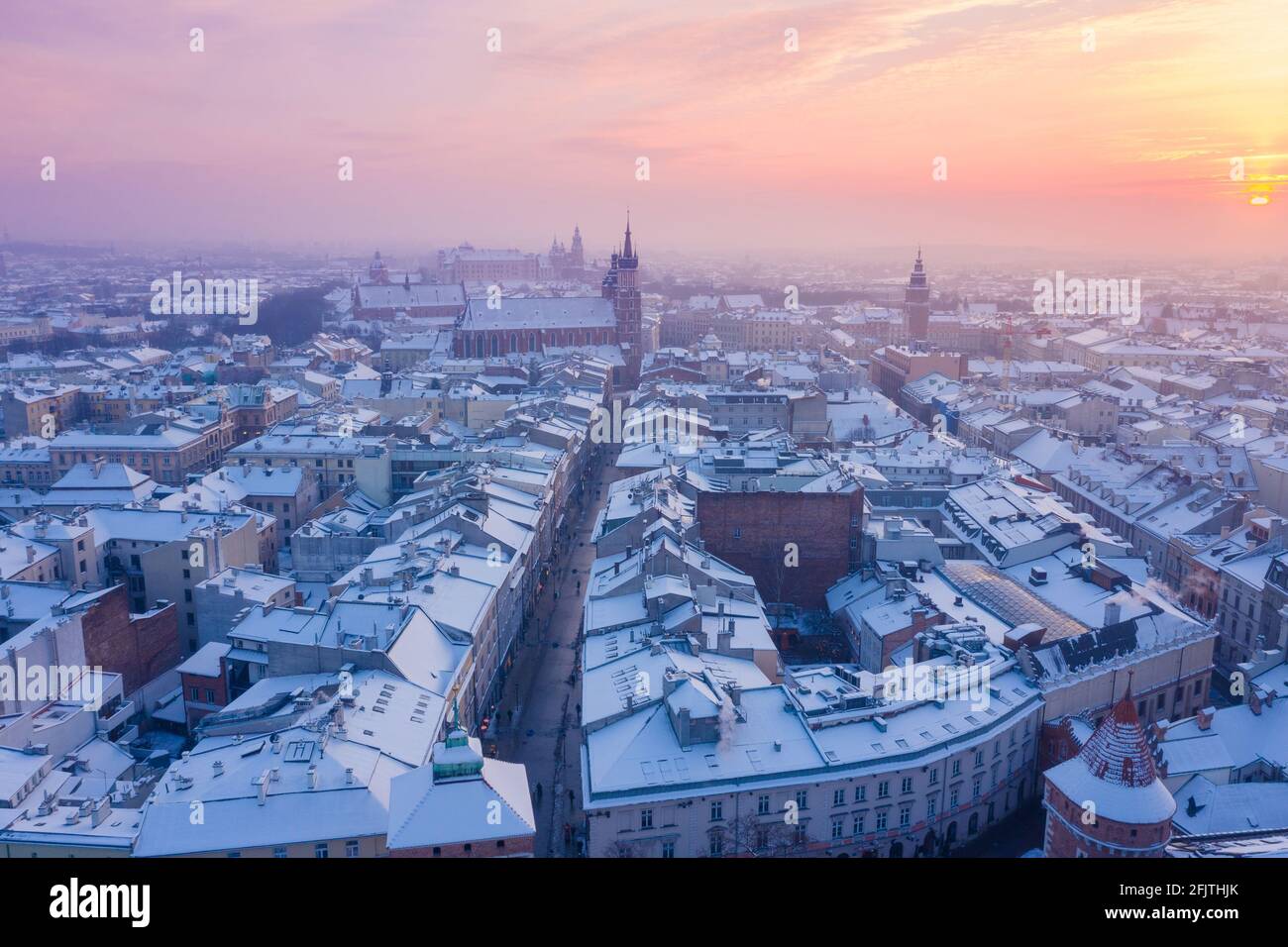 Krakow Old Town in winter. Snow on roofs at Old Town in winter Krakow ...
