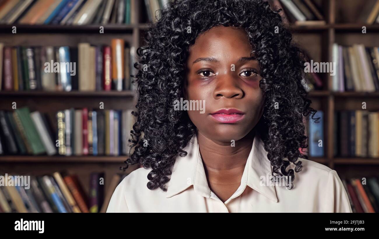 Portrait of an African American woman with bruises. Domestic violence ...