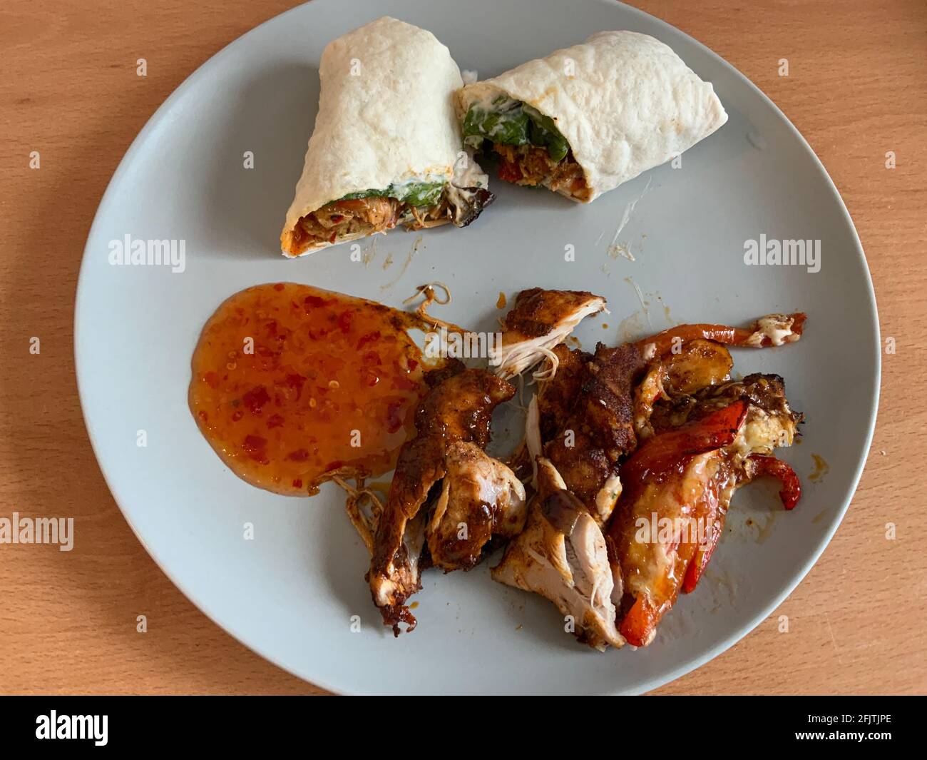 Making chicken wrap Stock Photo - Alamy