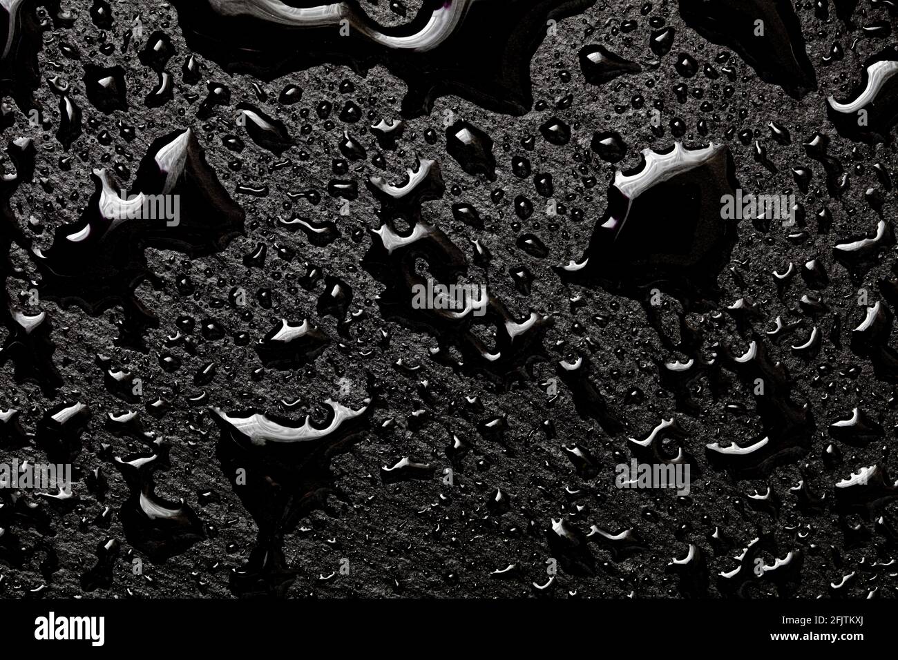 Water drops on black slate tray, background, pattern Stock Photo - Alamy