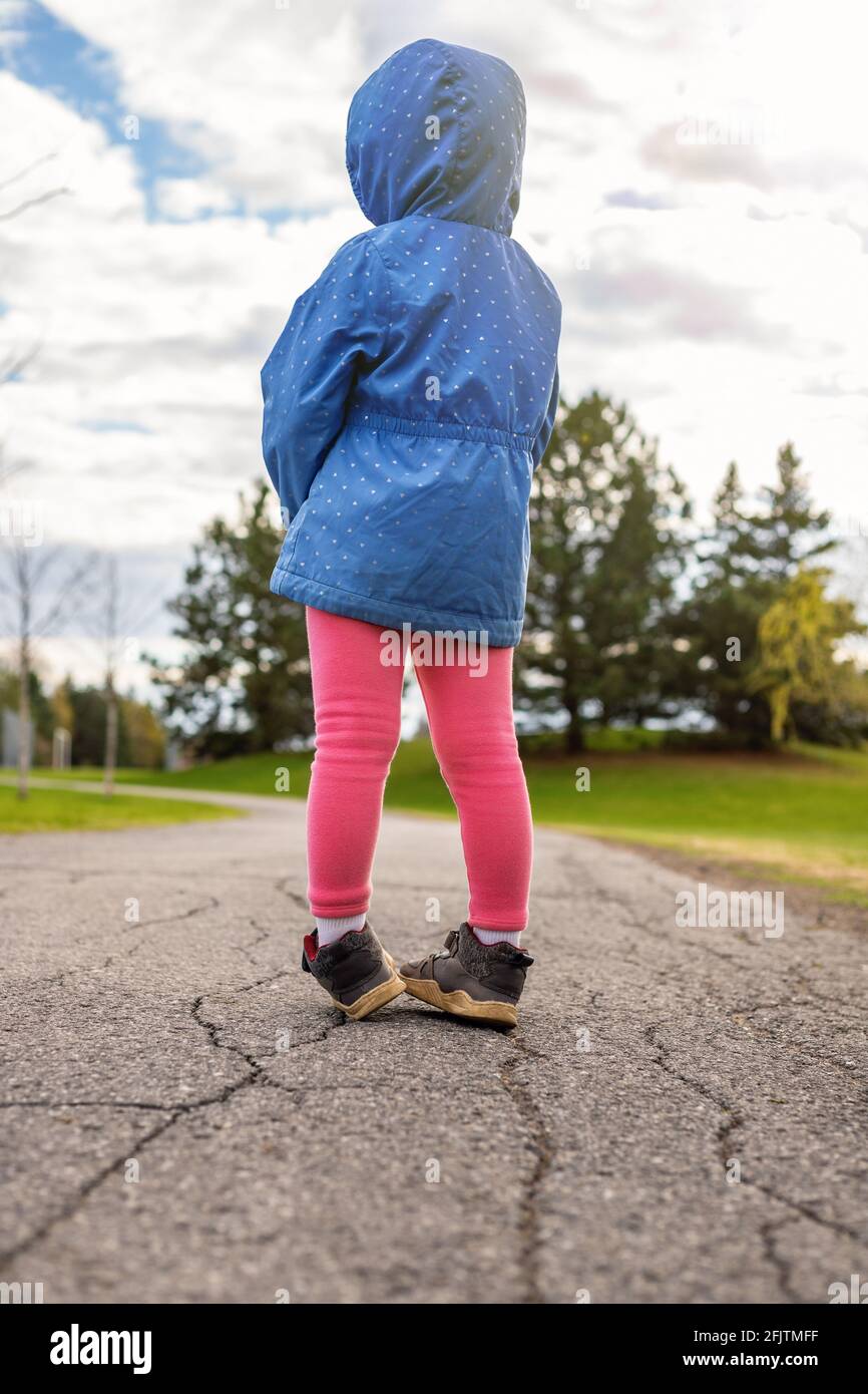 Person walking from behind hi-res stock photography and images - Alamy