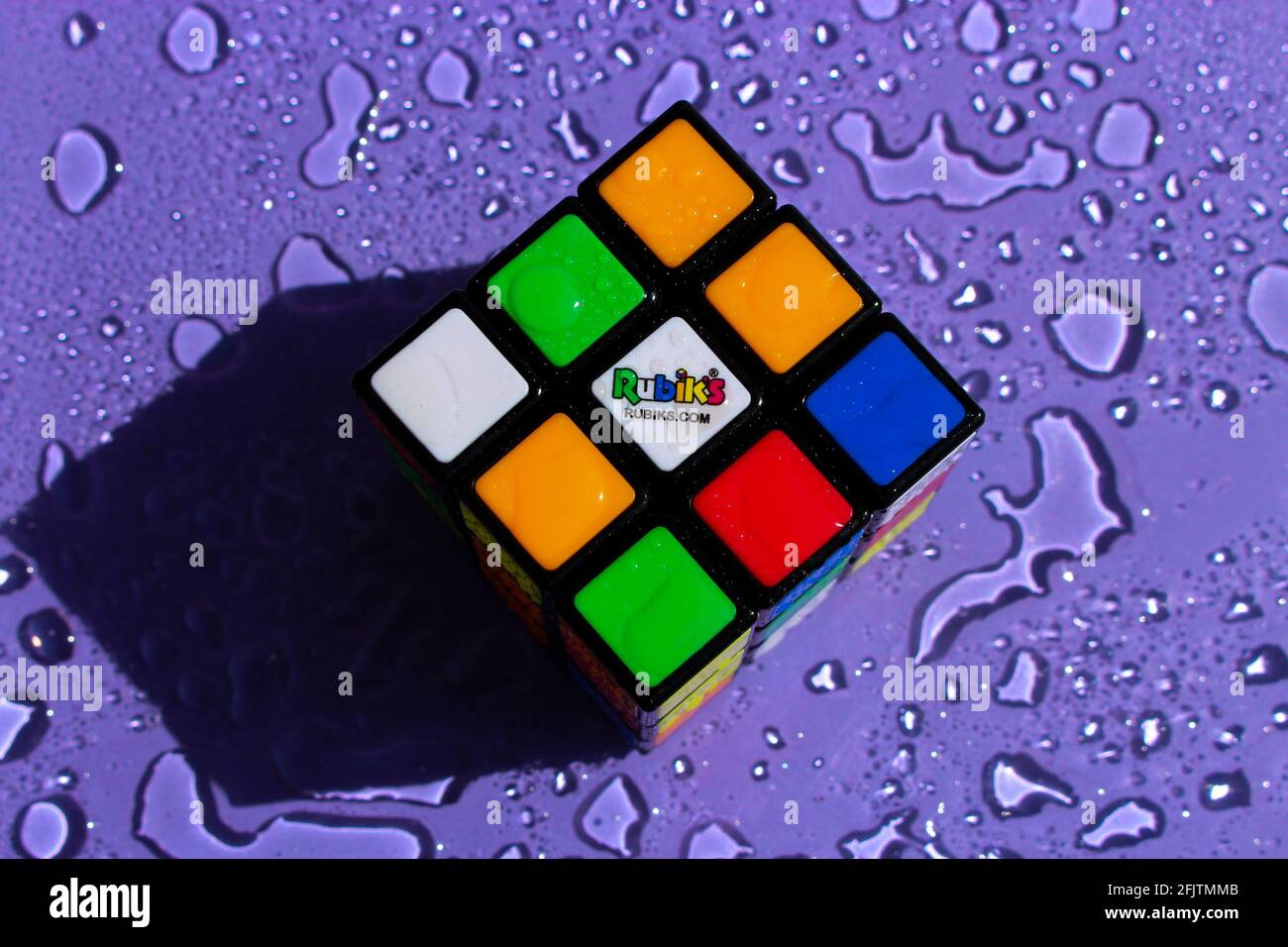 purple rubiks cube birds eye view Stock Photo - Alamy