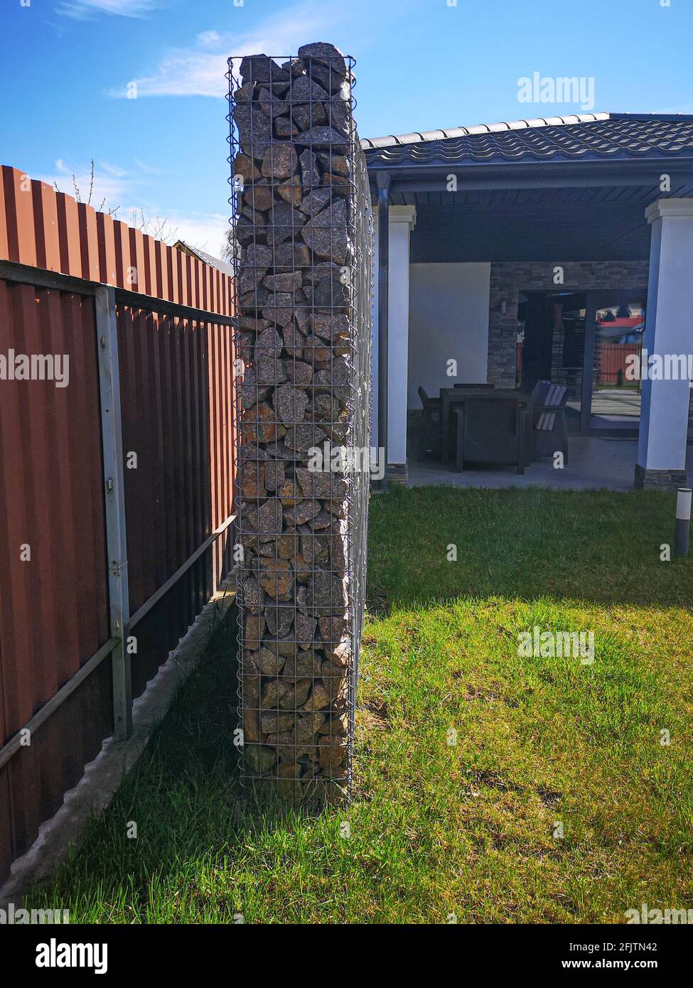 stone fence. rectangular stone fence Stock Photo - Alamy