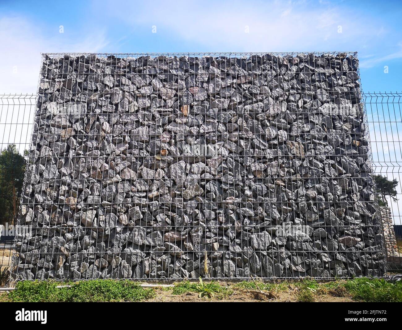 stone fence. rectangular stone fence Stock Photo - Alamy