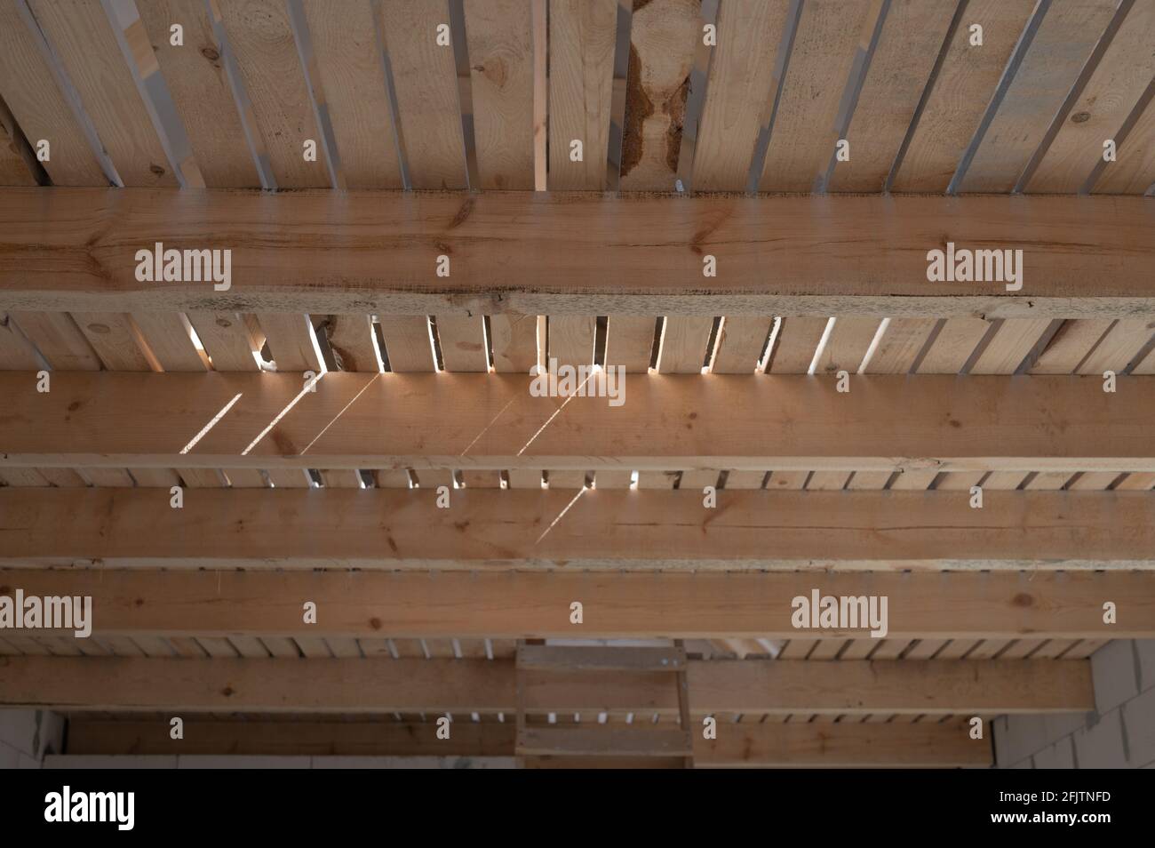 wooden ceiling bottom view. internal work Stock Photo - Alamy
