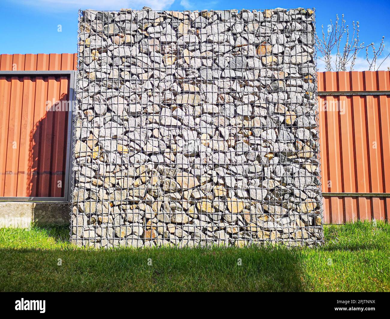 stone fence. rectangular stone fence Stock Photo - Alamy