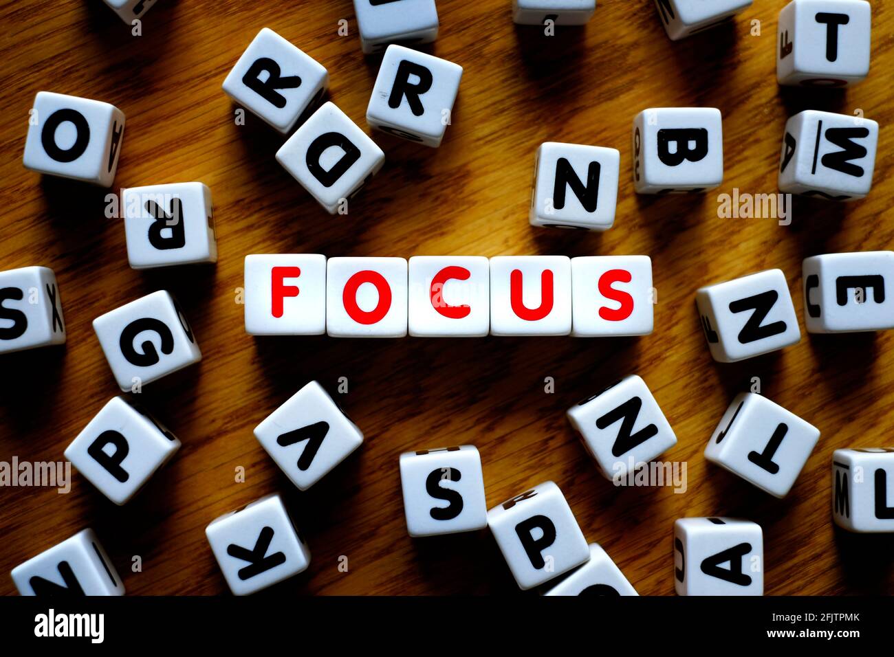 Word focus mixed with letters representing achievement through precise ...