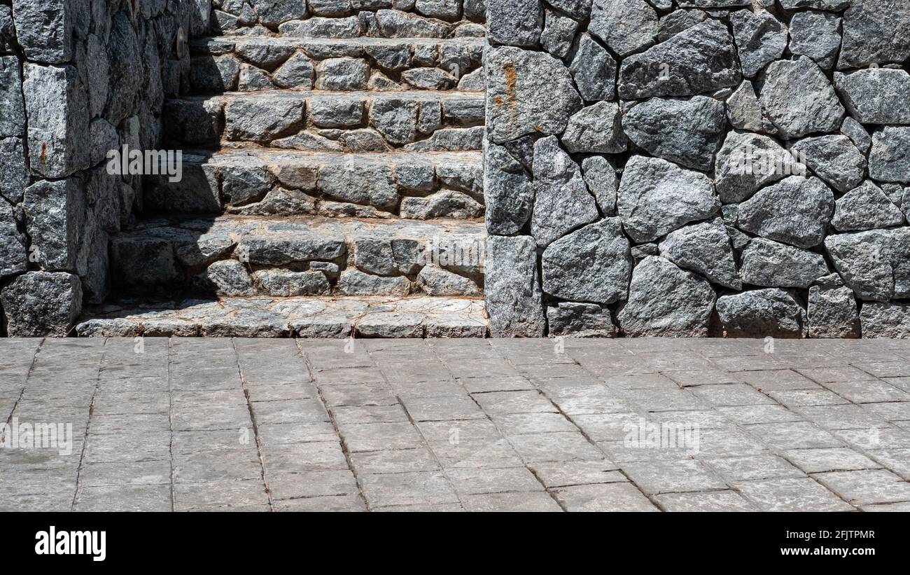 Gray granite stone wall and granite staircase in the park Stock Photo - Alamy