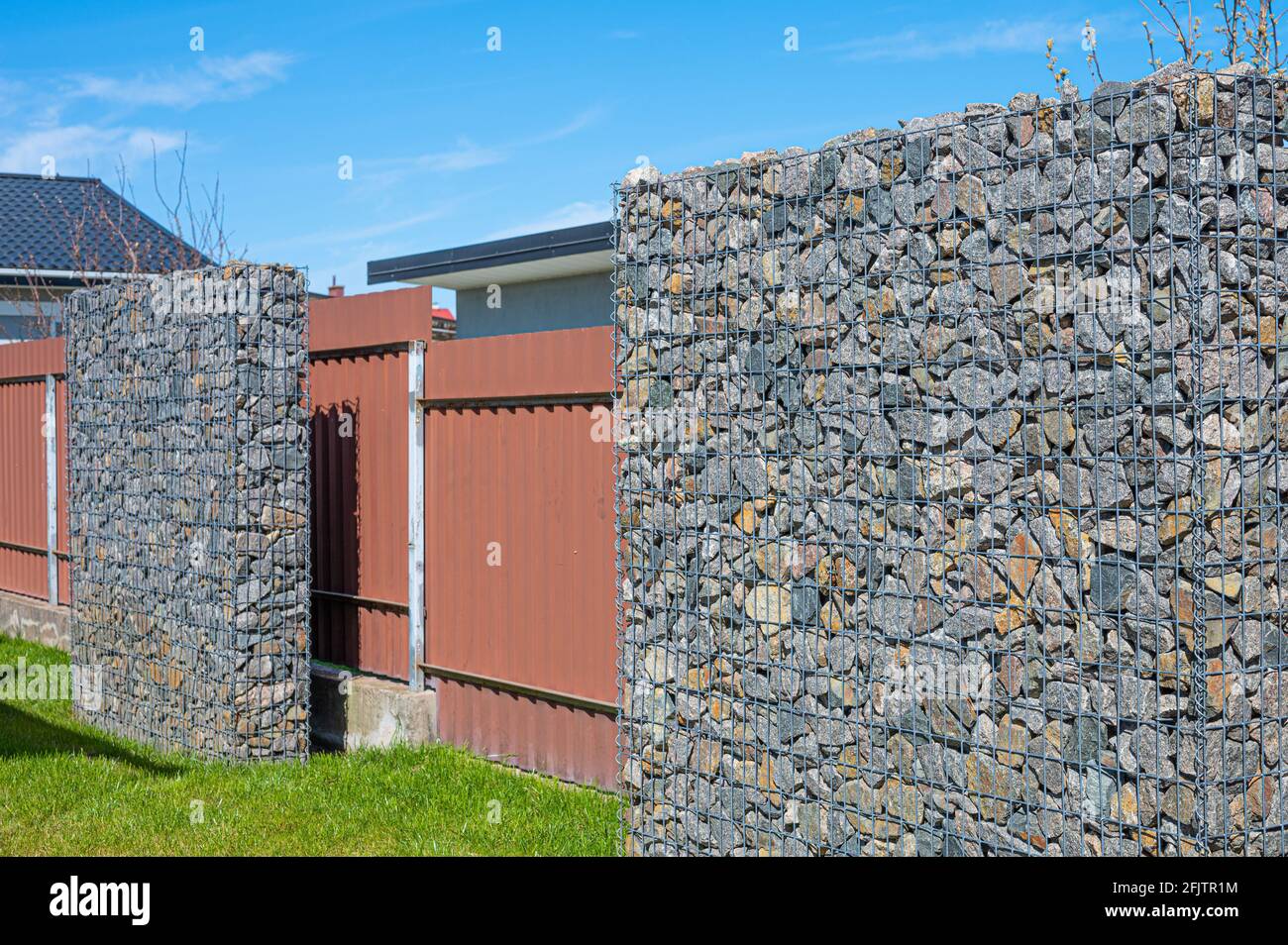 stone fence. rectangular stone fence Stock Photo - Alamy