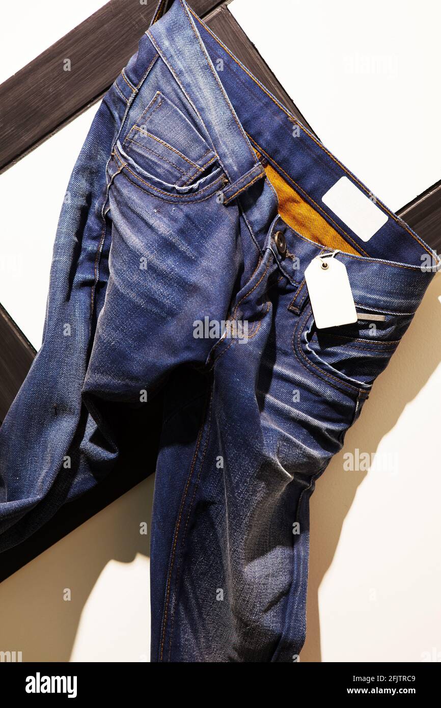 Jeans pants on window display Stock Photo - Alamy