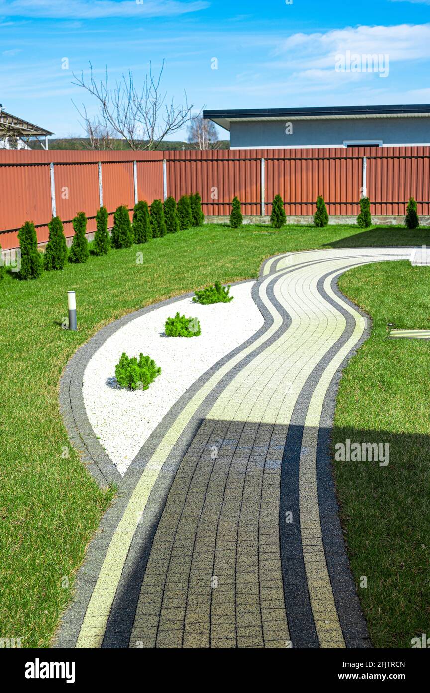 winding path laid out on the ground Stock Photo - Alamy