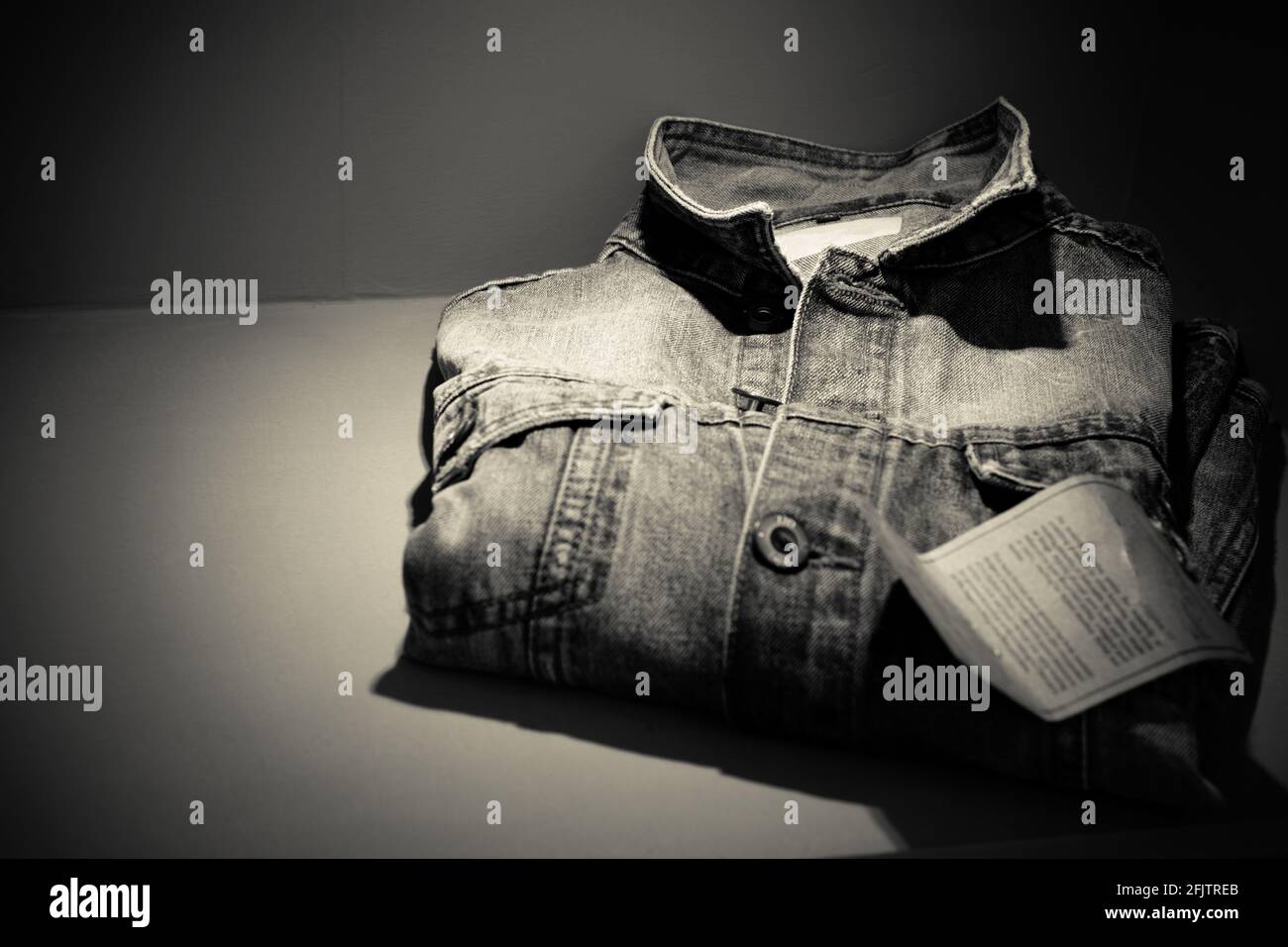 Jean Denim shirts on window display Stock Photo - Alamy