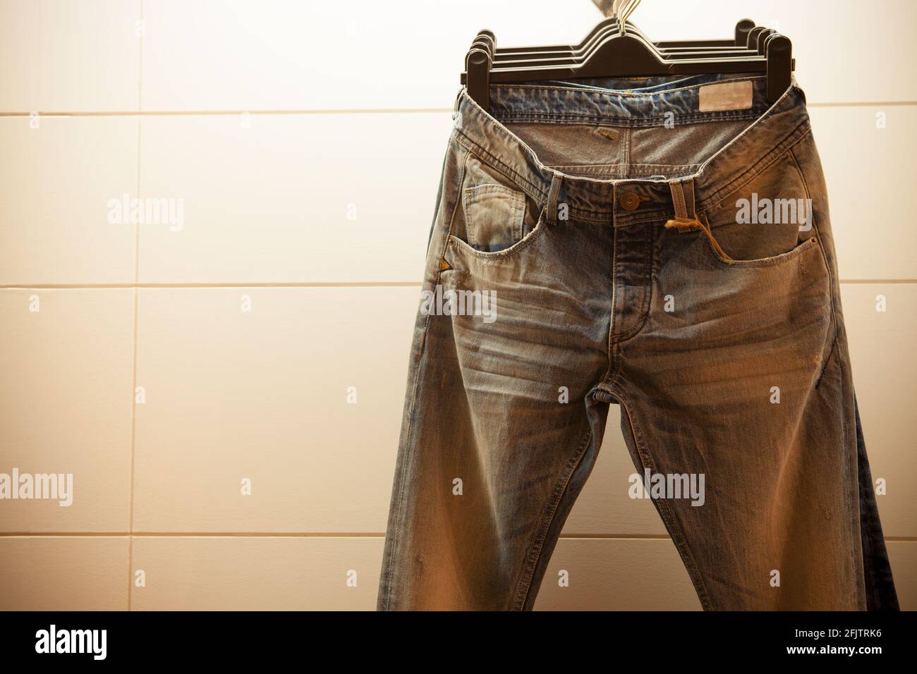 Jeans pants on window display Stock Photo - Alamy