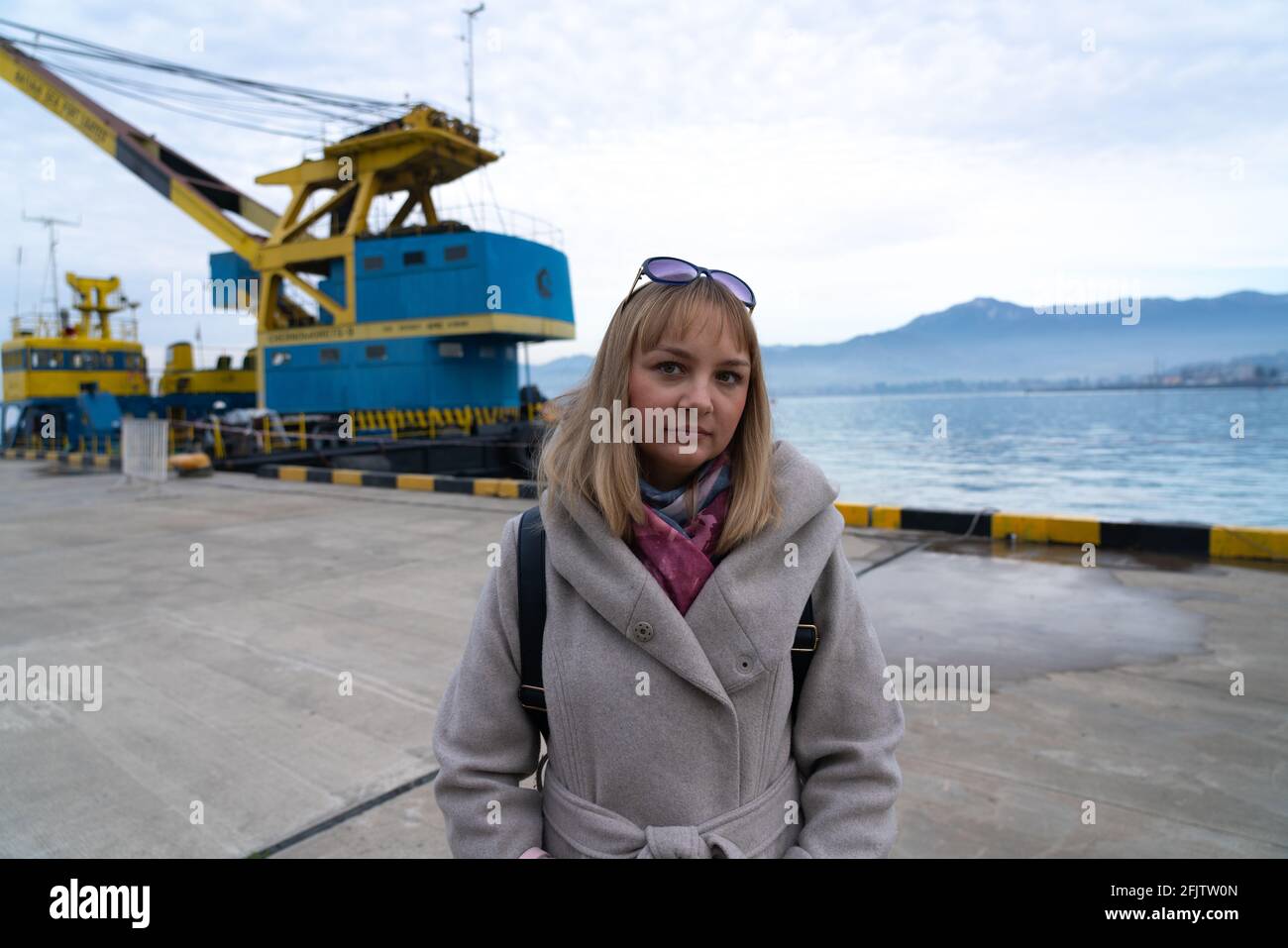 girl walking in the port Stock Photo - Alamy