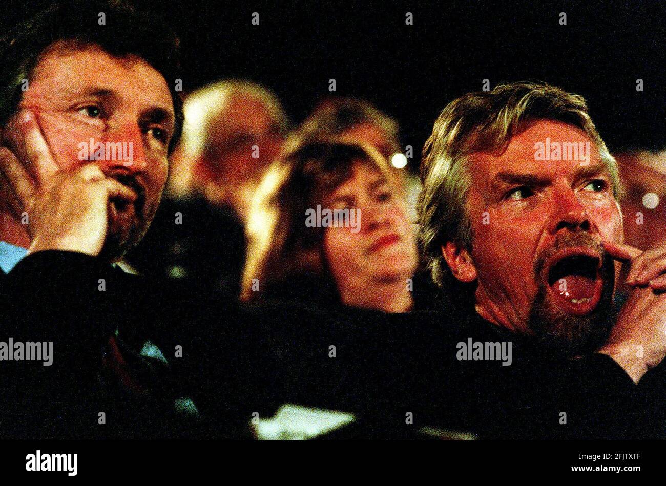 RICHARD BRANSON SITS WITH CLIVE HOLLICK. IN THE AUDIENCE OF THE CROSS ...