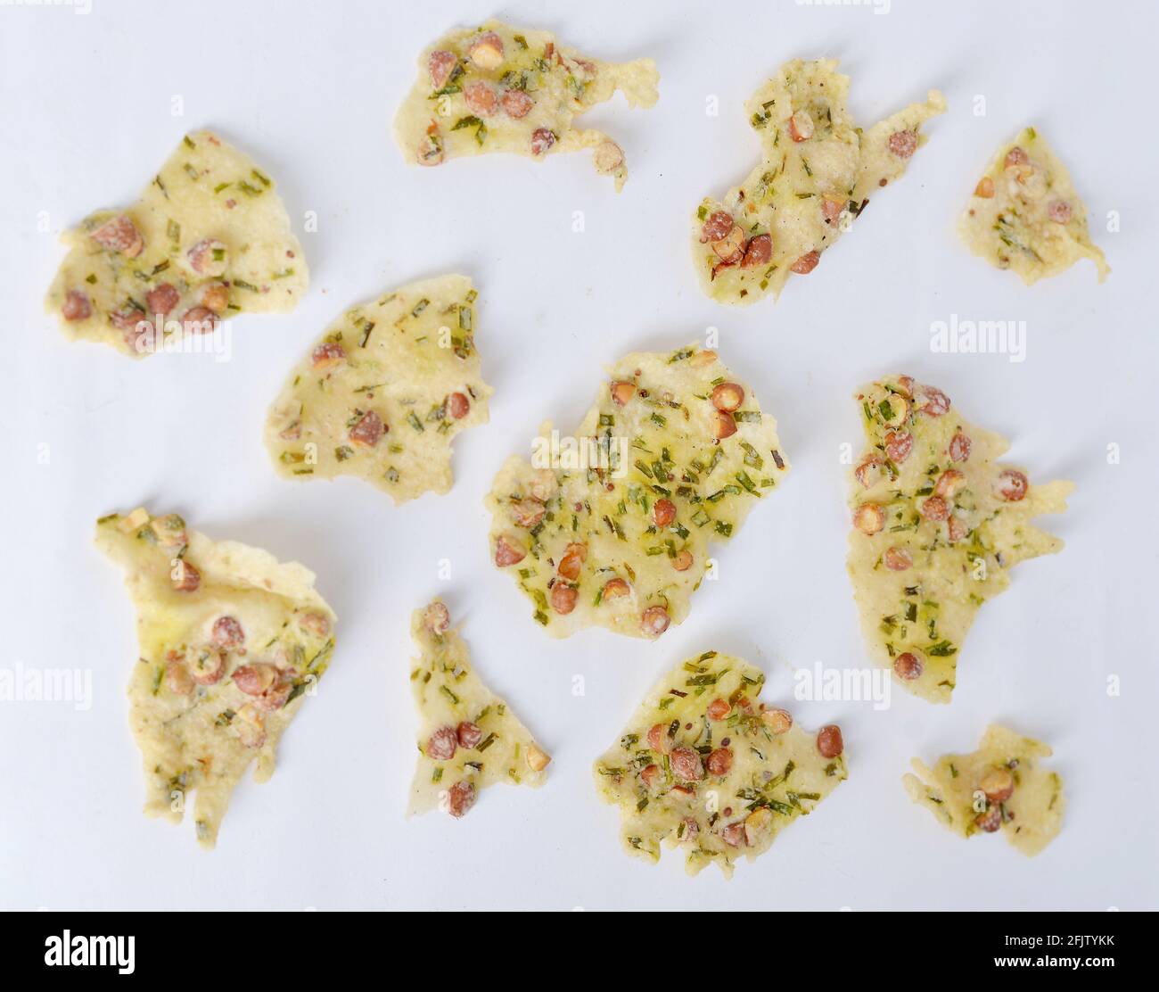 Peyek Kacang or peanut rempeyek in white background. Deep fried savoury ...