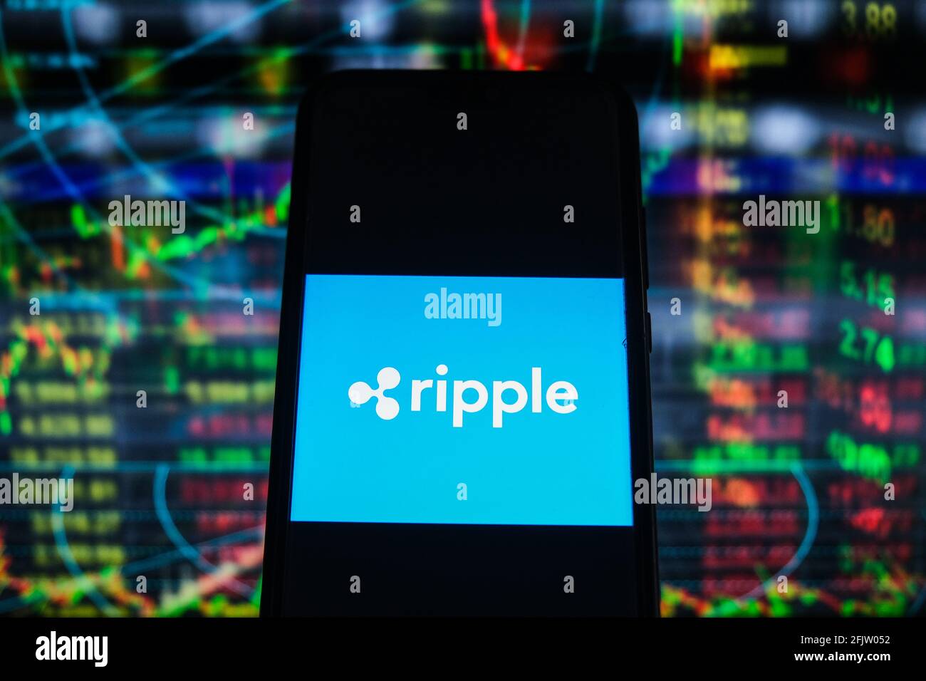In this photo illustration a Ripple logo seen displayed on a smartphone ...
